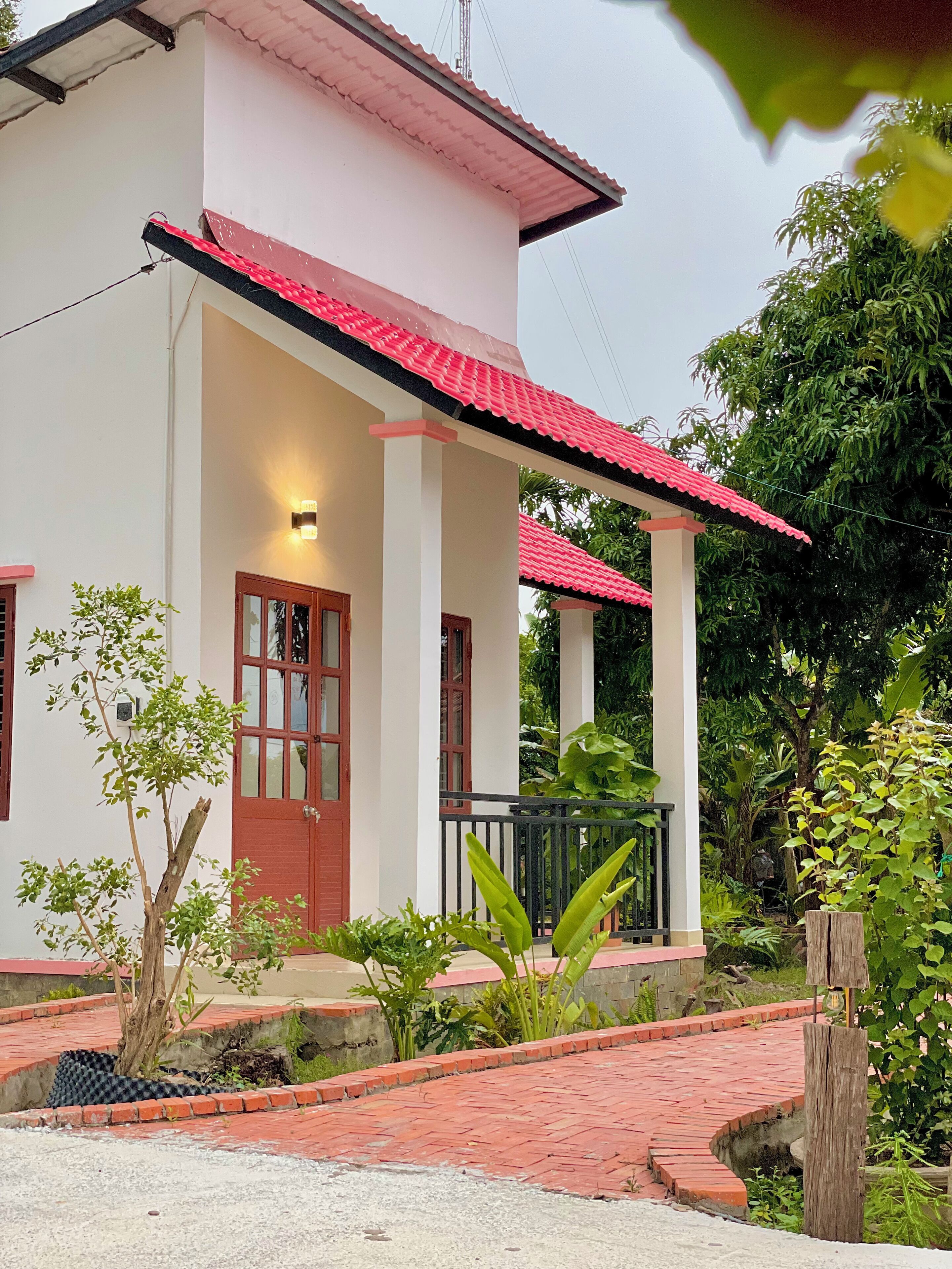 Quarto triplo, sacada, vista para o jardim | Vista para o jardim