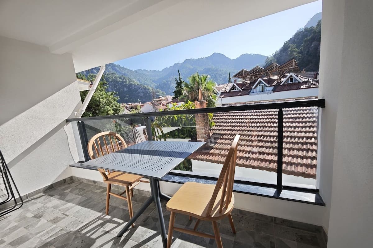Quarto Duplo Deluxe, vista para a montanha | 2 quartos, roupa de alta qualidade, cofre com capacidade para portátil