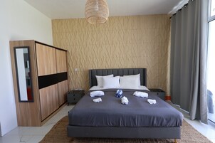 Suite de Luxo, pátio, vista para a piscina | 1 quarto, Wi-fi grátis 