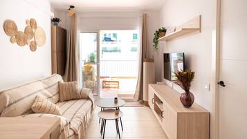 Apartamento, 1 quarto, terraço | Sala de estar