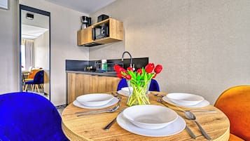 Apartamento (1209) | Área de estar | TV de tela plana
