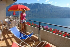 Apartamento conforto, 2 quartos | Sacada