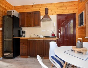 Apartamento Deluxe, 2 quartos | Restaurantes