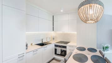 Apartament (1/4) | Cozinha privada | Geladeira, micro-ondas, cooktop, lava-louças