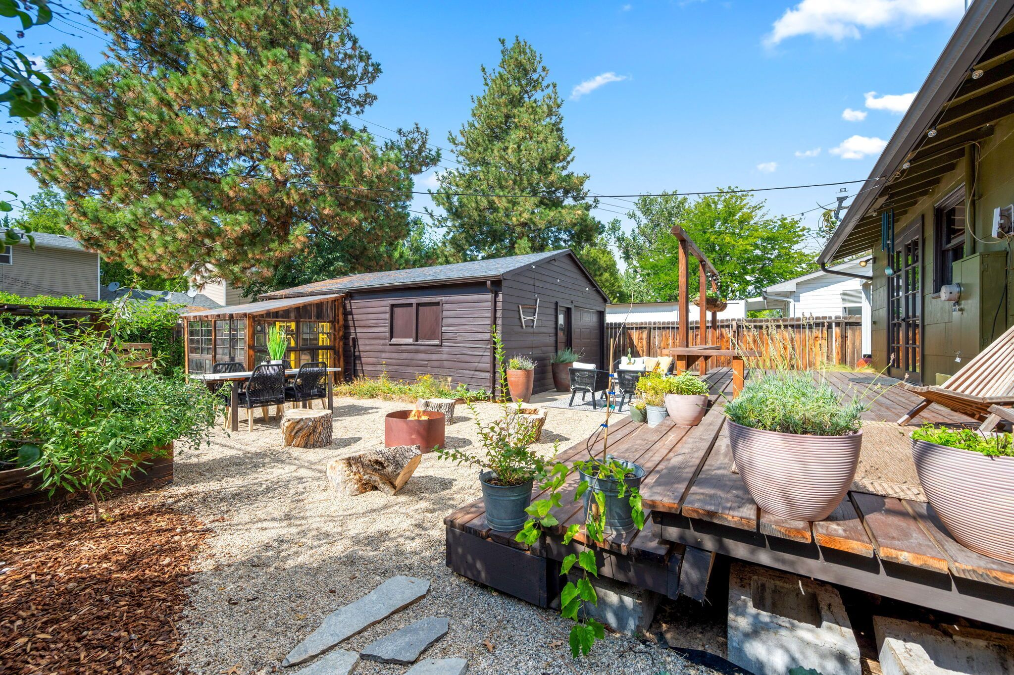 Charming Urban Ranch - garden oasis, fire pit in relaxing backyard ...