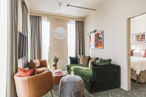 Suite Júnior | Minibar, cortinas/cortinados opacos, ferro/tábua de engomar 