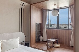 Quarto casal, 1 cama Queen, sacada | Vista do quarto