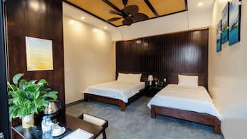 Quarto Triplo Deluxe, vista para a piscina | Quartos insonorizados, Wi-fi grátis