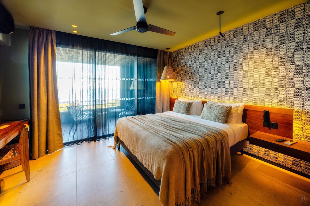 Chambre Deluxe Savane | Cofres nos quartos, cortinas blackout, Wi-Fi de cortesia
