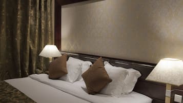1 quarto, roupas de cama antialérgicas, frigobar