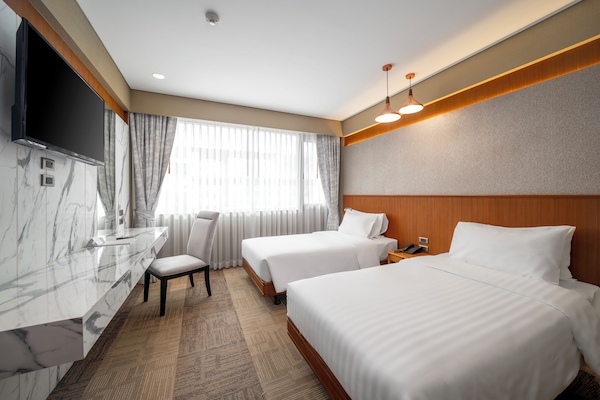 Quarto Twin Deluxe, Vista para a cidade | Vista para a cidade