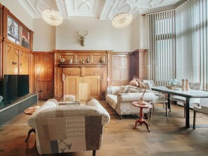 Apartamento | Sala de estar | Televisor