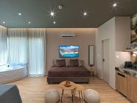 Suíte premium | Roupas de cama premium, camas Select Comfort, frigobar