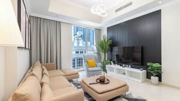 Apartamento Executivo, 3 quartos, varanda, Vista para a cidade | Sala de estar | Smart TV de 42 polegadas com canais digitais, Netflix