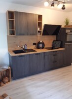 Apartamento em Condomínio Fechado, varanda, vista para a montanha | Cozinha privada