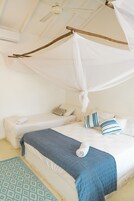 Quarto família | Frigobar, cofres nos quartos, quartos à prova de som, Wi-Fi de cortesia