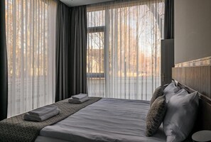 Apartamento Premium, 1 quarto | Secretária, secretária adequada para computadores portáteis 