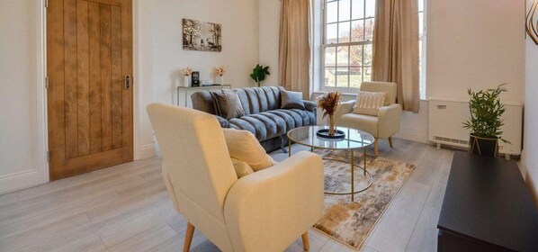 Apartamento | Área de estar | TV