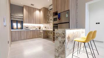 Apartamento superluxo | Cozinha privada | Cadeirão de bebê