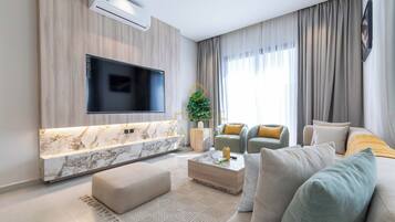 Apartamento superluxo | Área de estar | TV