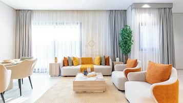 Apartamento superluxo | Área de estar | TV