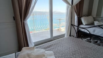 Suíte júnior, vista para o mar | 1 quarto, lençóis italianos Frette, roupas de cama premium