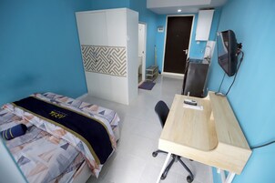 Quarto Duplo Deluxe, Vista para a cidade | Secretária 