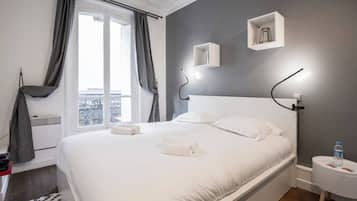 Apartamento | 1 quarto, ferros/tábuas de passar roupa, roupa de cama