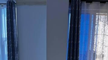 Apartamento Deluxe, varanda, Vista para a cidade | 2 quartos, com decoração personalizada, com mobília individualizada