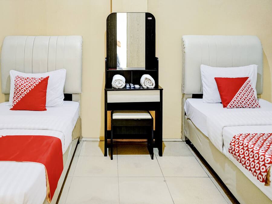 Quarto Twin Deluxe | Roupa de cama fornecida