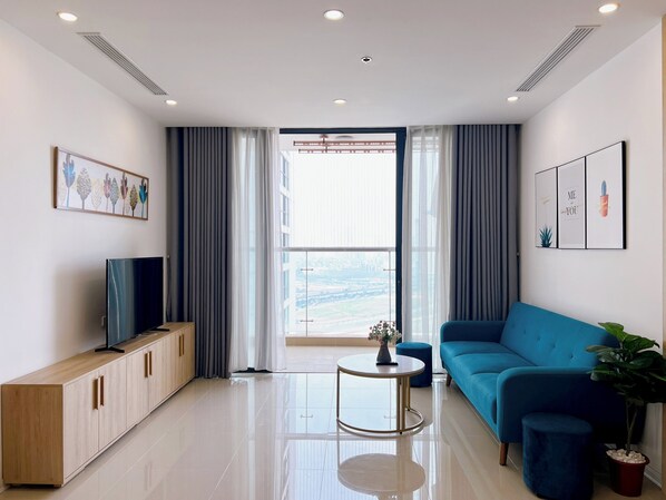 Apartamento superluxo, 2 quartos, vista para a cidade | Área de estar