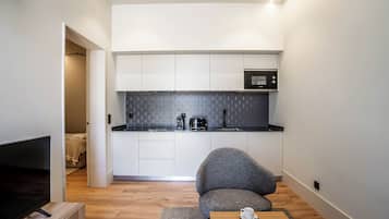 Apartamento conforto | Área de estar | TV