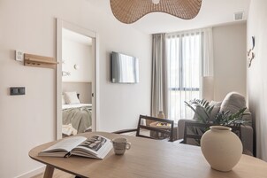 Apartamento, 1 quarto | Sala de estar