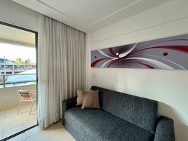 Apartamento | Área de estar | TV