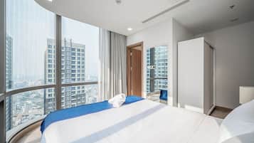 Suíte família, 3 quartos, acesso ao Club Lounge, vista para a cidade | Vista do quarto