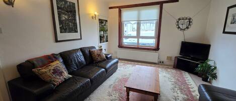 Apartamento | Sala de estar | Televisor