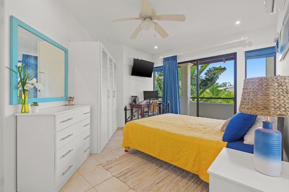 Sunshine Escape with a Rooftop Patio - Coco | Vrbo