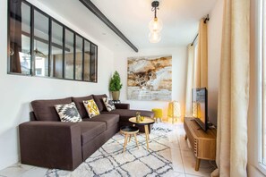 Apartamento família | Área de estar