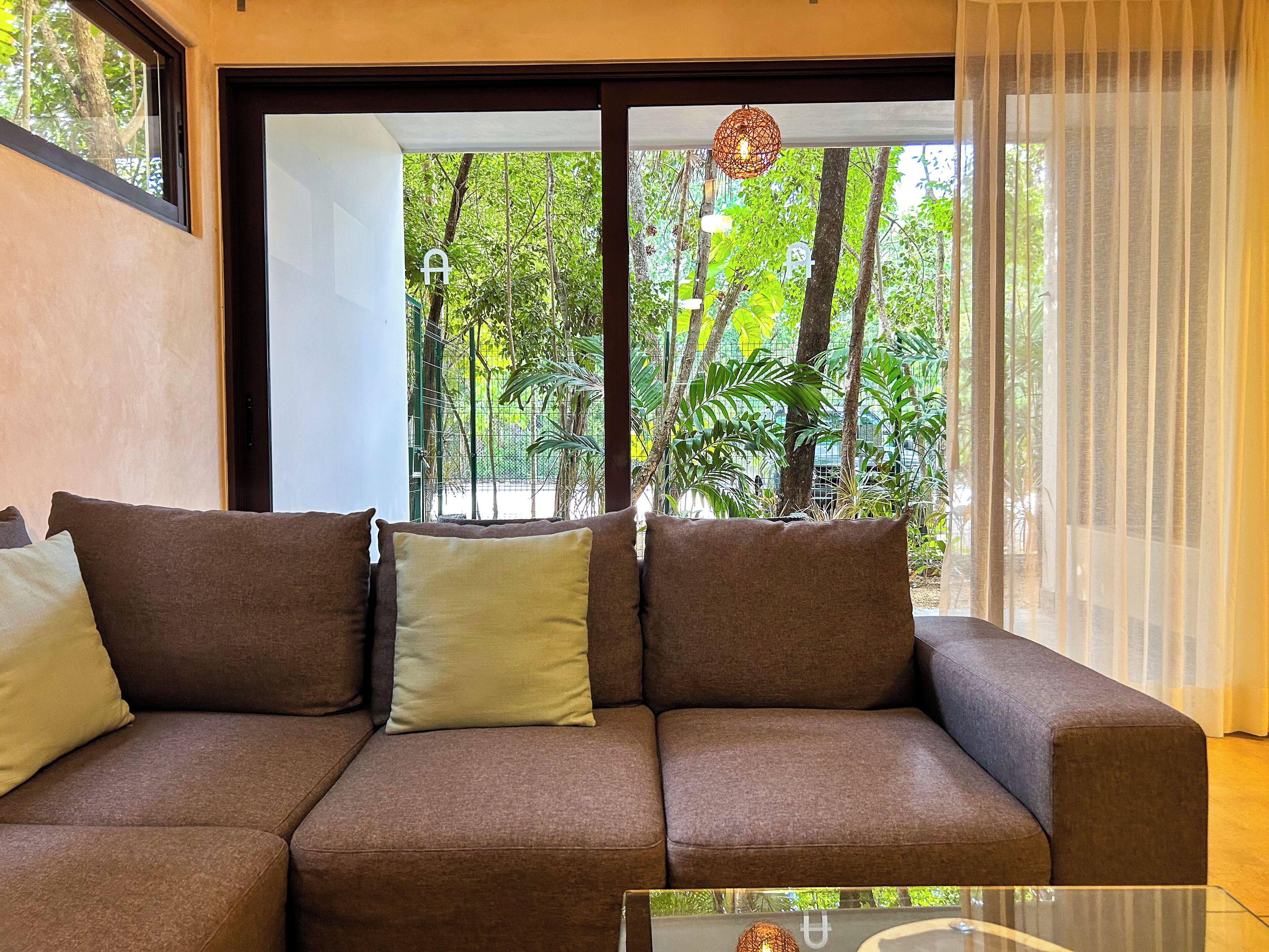 Apartamento superior, varanda | Área de estar