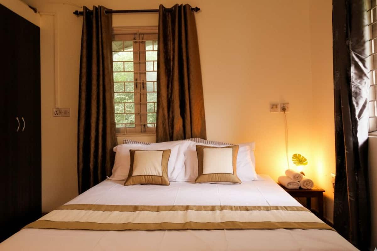 Apartamento superluxo, 1 cama Queen e sofá-cama, vista para o jardim, no piso térreo | Parte interna