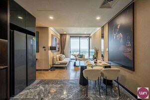 Apartamento Premium, 1 quarto, pátio, Vista para a cidade | Sala de estar