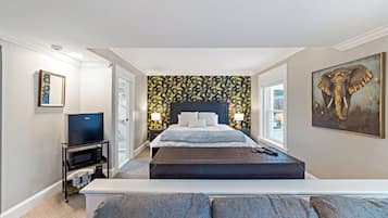 Suite, 1 cama king-size e sofá-cama | 1 quarto, secretária adequada para computadores portáteis, Wi-fi grátis
