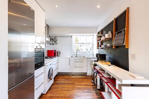 Apartamento | Cozinha privada | Mesas de jantar 