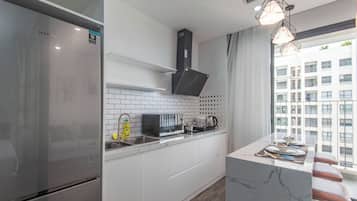 Suite Deluxe, Vista para a cidade | Cozinha privada