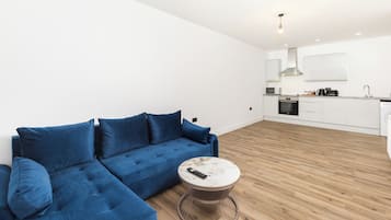 Suite Superior | Sala de estar | Smart TV de 50 polegadas com canais digitais