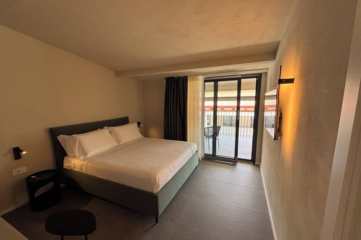 Quarto Deluxe | Minibar, cortinas/cortinados opacos, Wi-fi grátis