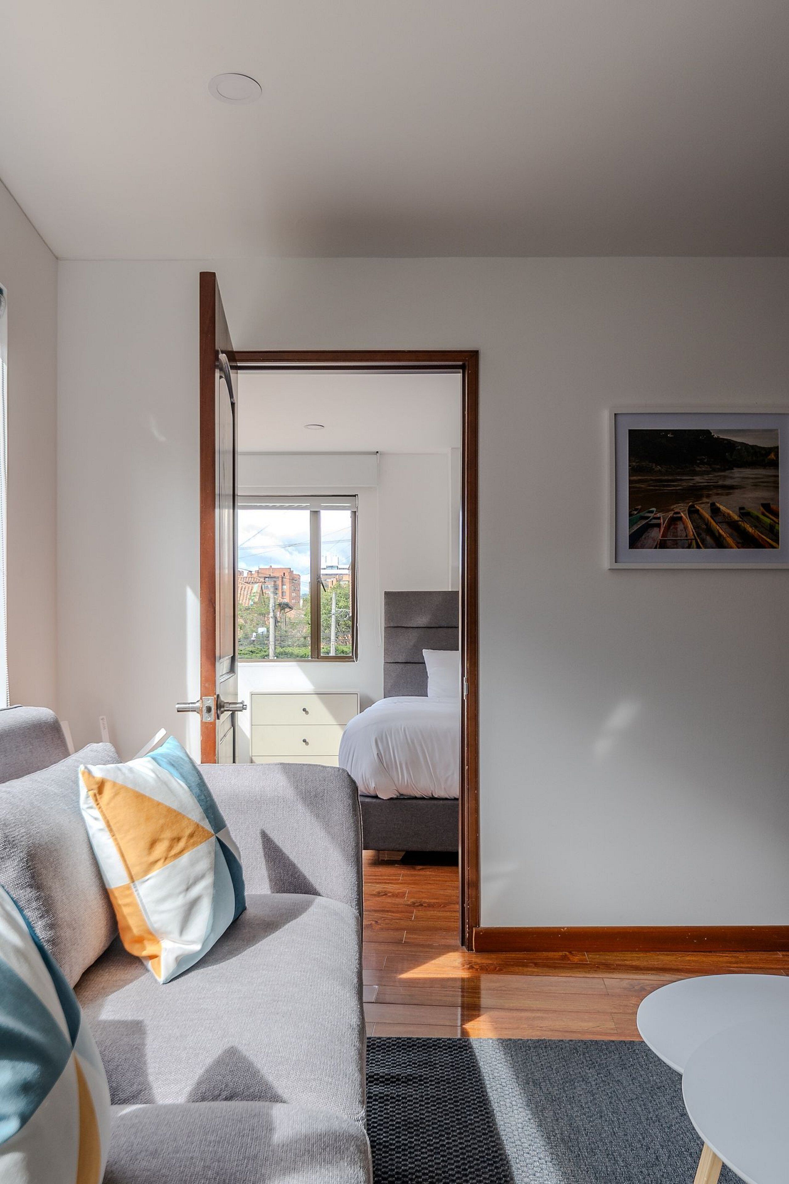 Apartamento superior, 3 quartos | Área de estar