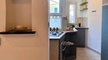 Apartamento, vista para o jardim | Cozinha privada
