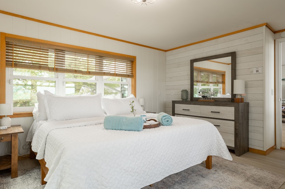 Charming 4-bedroom beachfront chalet on Sand Point in Caseville Twp ...