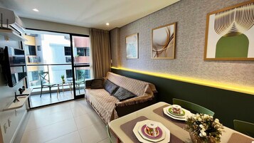 Apartamento | Área de estar | TV de tela plana